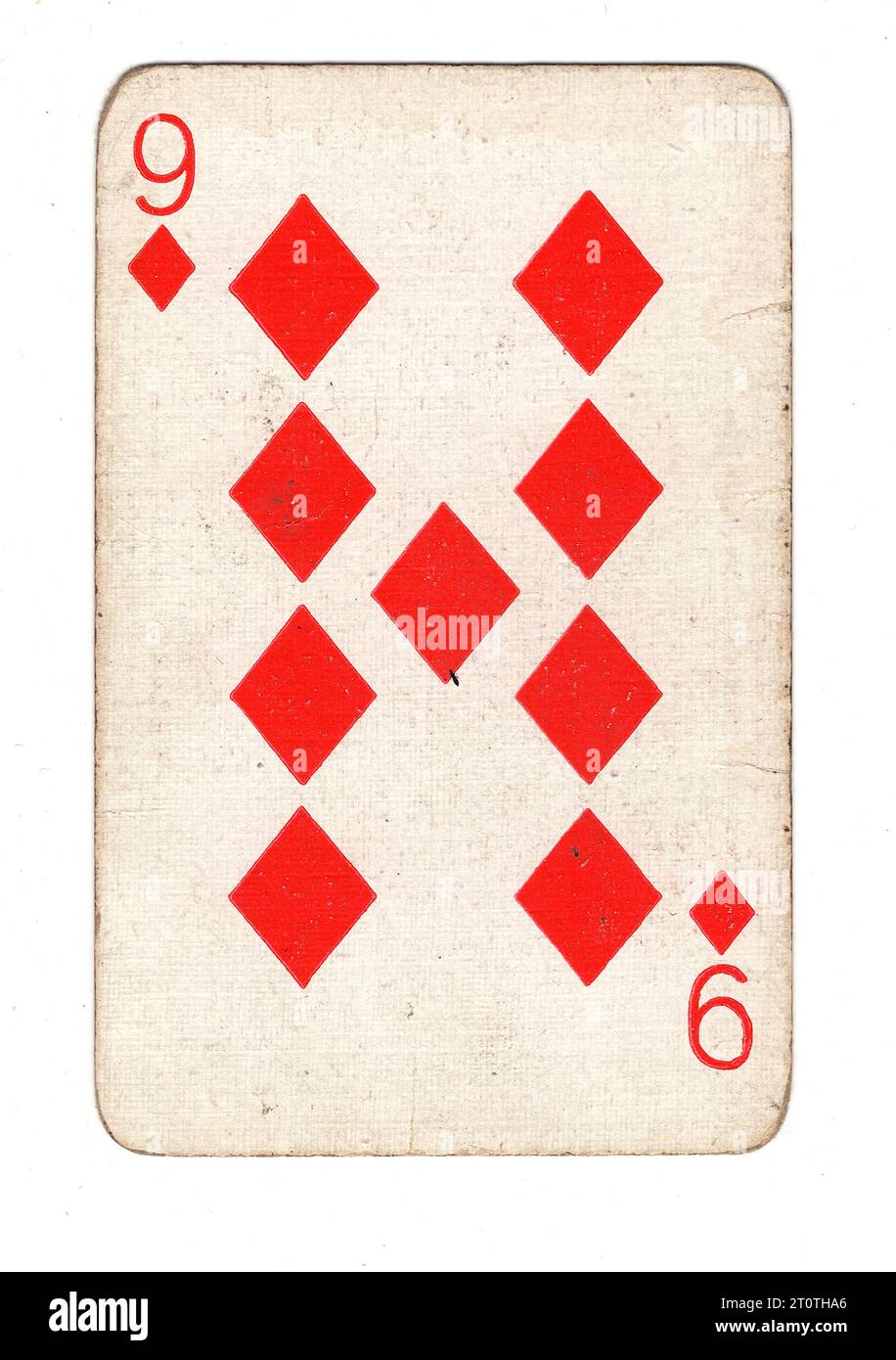 A vintage nine of diamonds playing card isolated on a white background ...