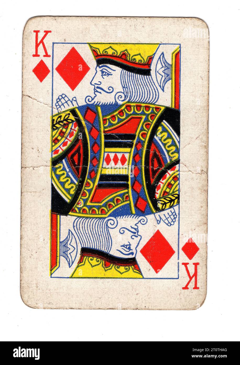 A vintage king of diamonds playing card isolated on a white background ...