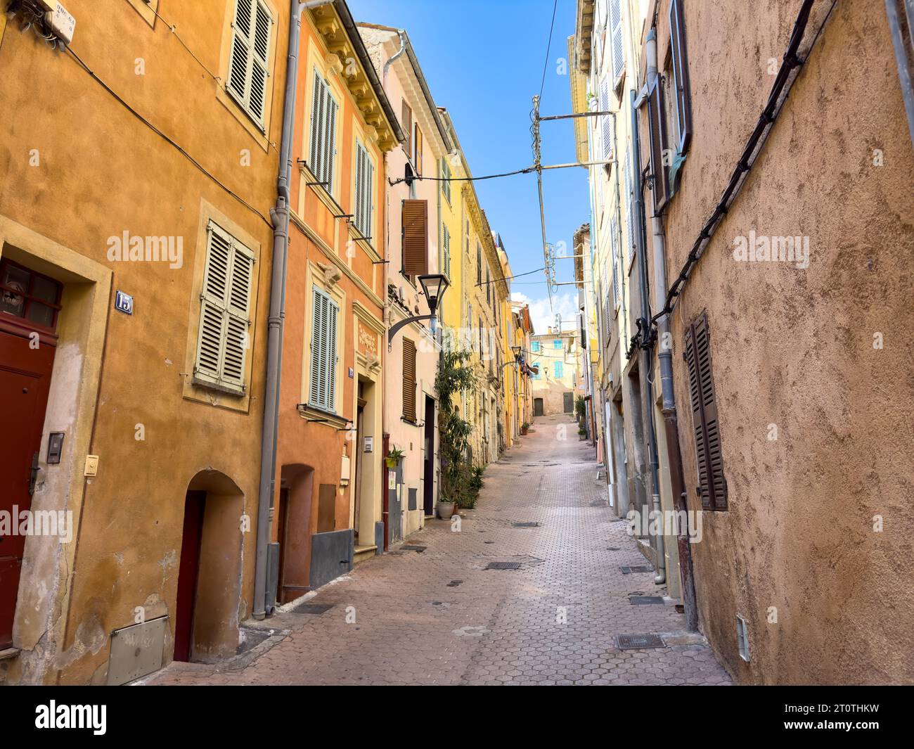 Rue du Four, and ancient traditional street of painted houses and ...