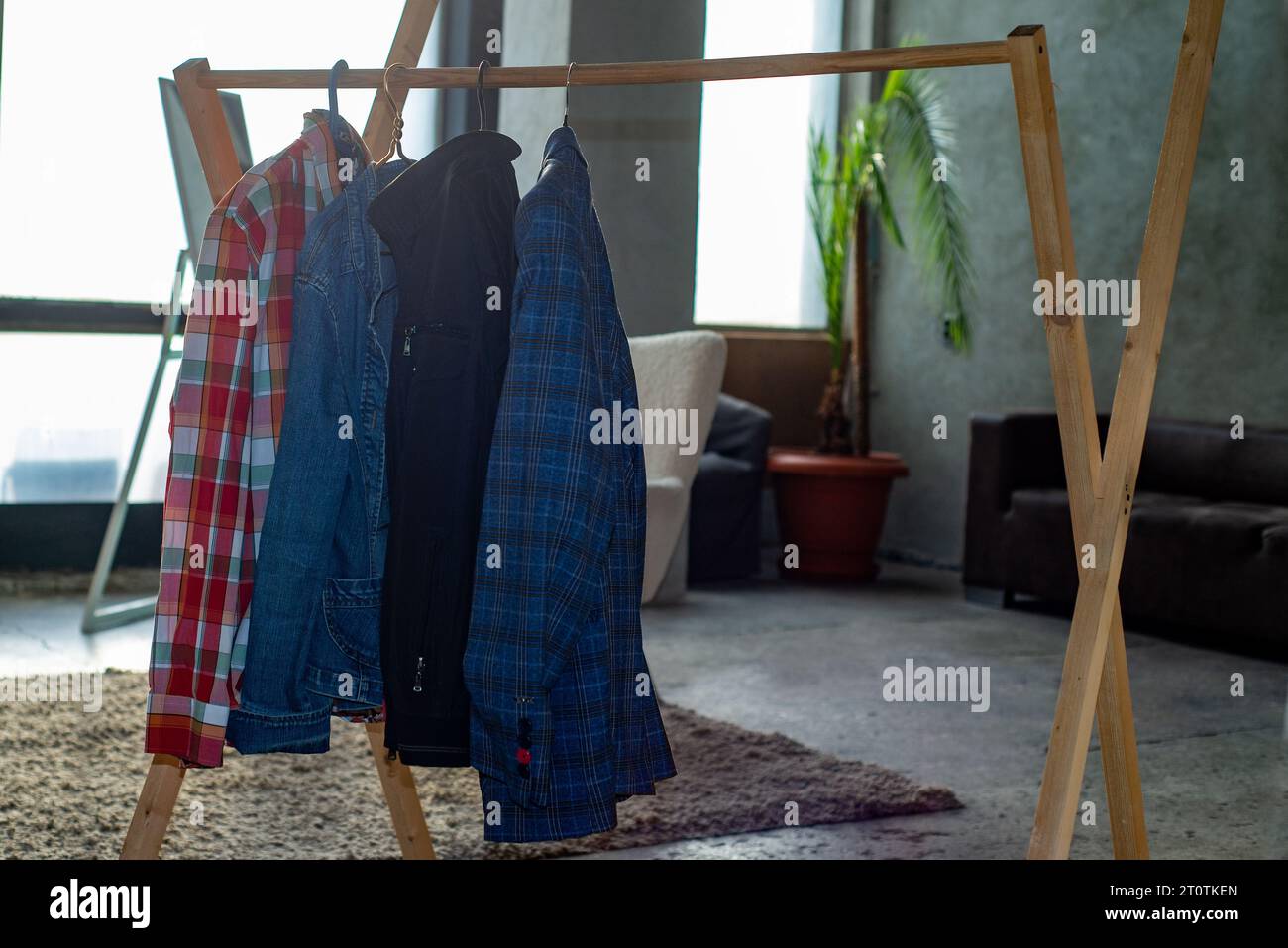 Man sorting wardrobe hi-res stock photography and images - Alamy