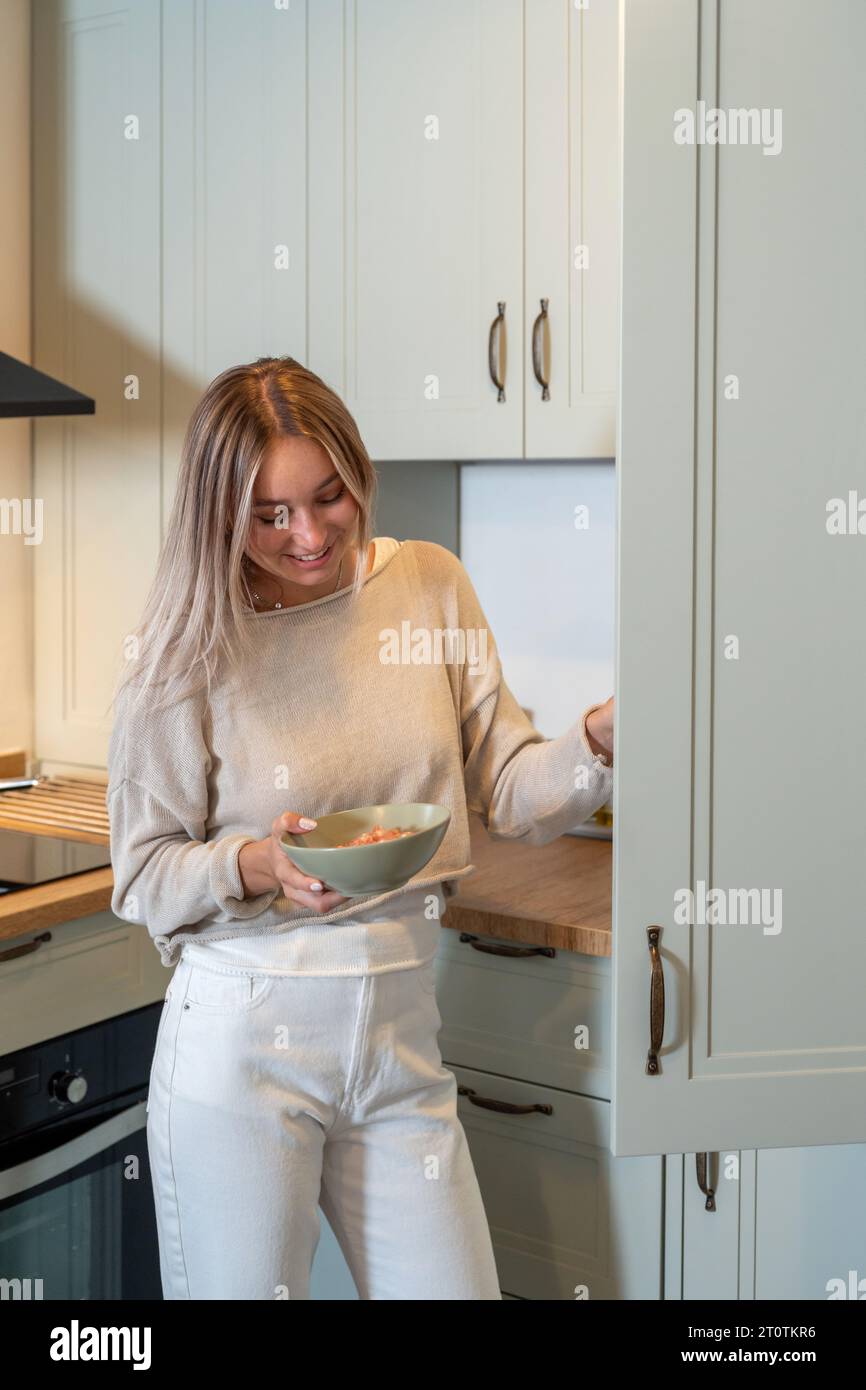 Grabbing food from fridge hi-res stock photography and images - Alamy