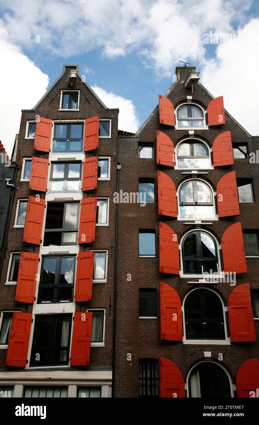 Converted warehouse with painted window shutters, Amsterdam. Holland ...