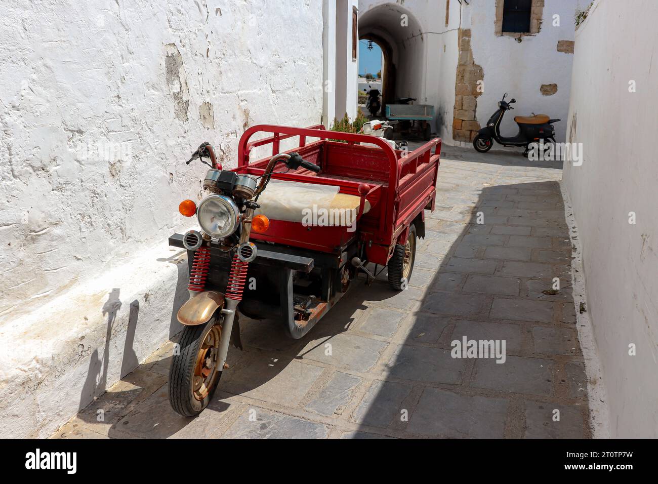 Red Tuk Tuk Rickshaw, a three wheel passenger transportation cart ...