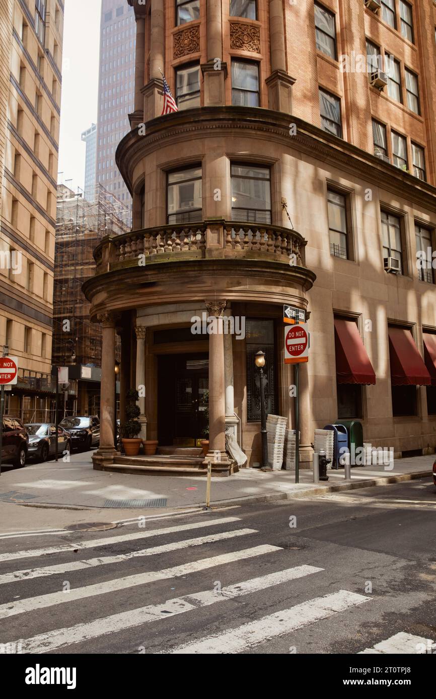 corner building with stone balustrade on balcony in downtown of new ...