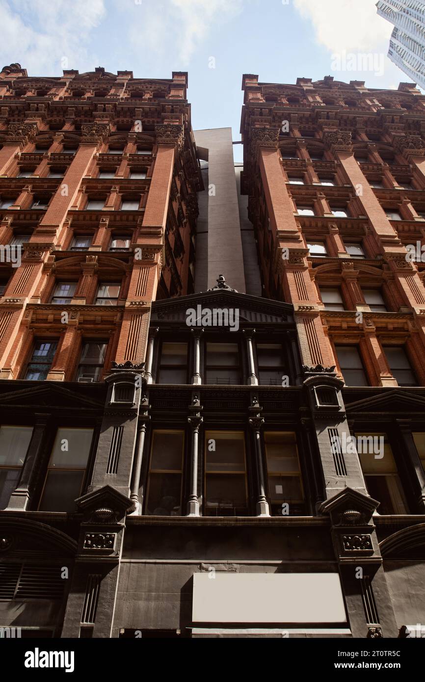vintage stone building in downtown of new york city, metropolis ...