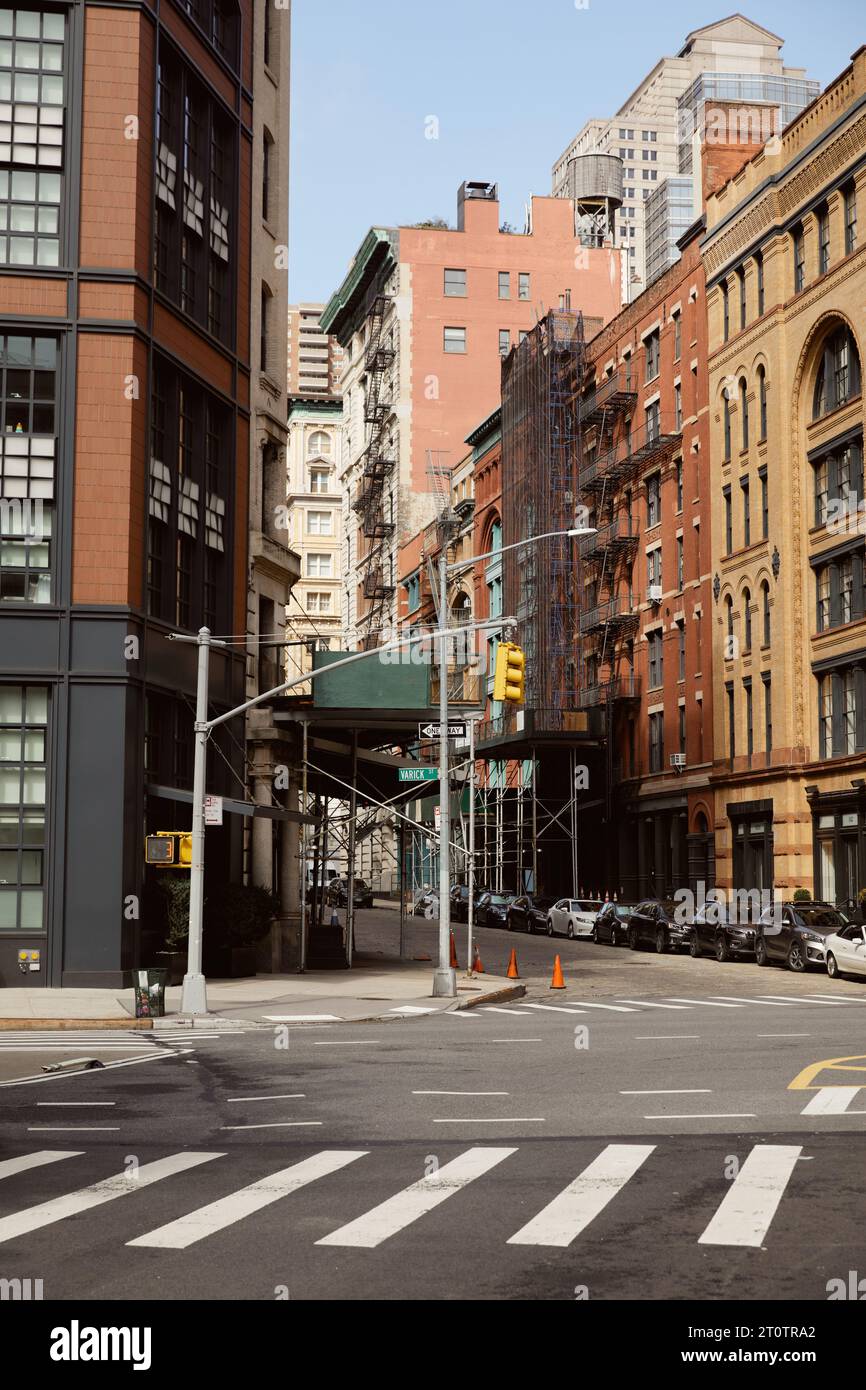new york street with modern and vintage buildings near traffic ...