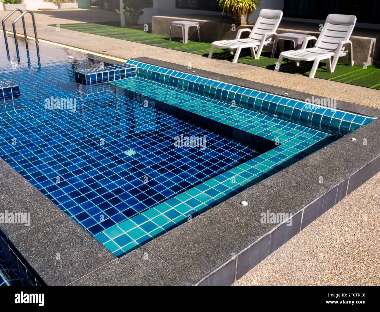 Floating bench seat, sitting zone in swimming pool with clean clear ...
