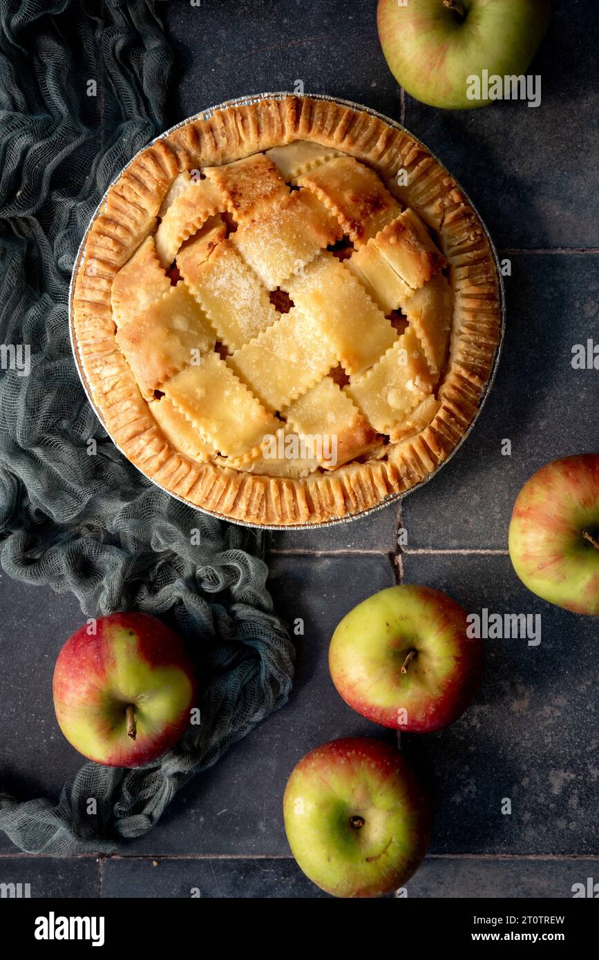 Apple pie on blue slate tile background Stock Photo - Alamy