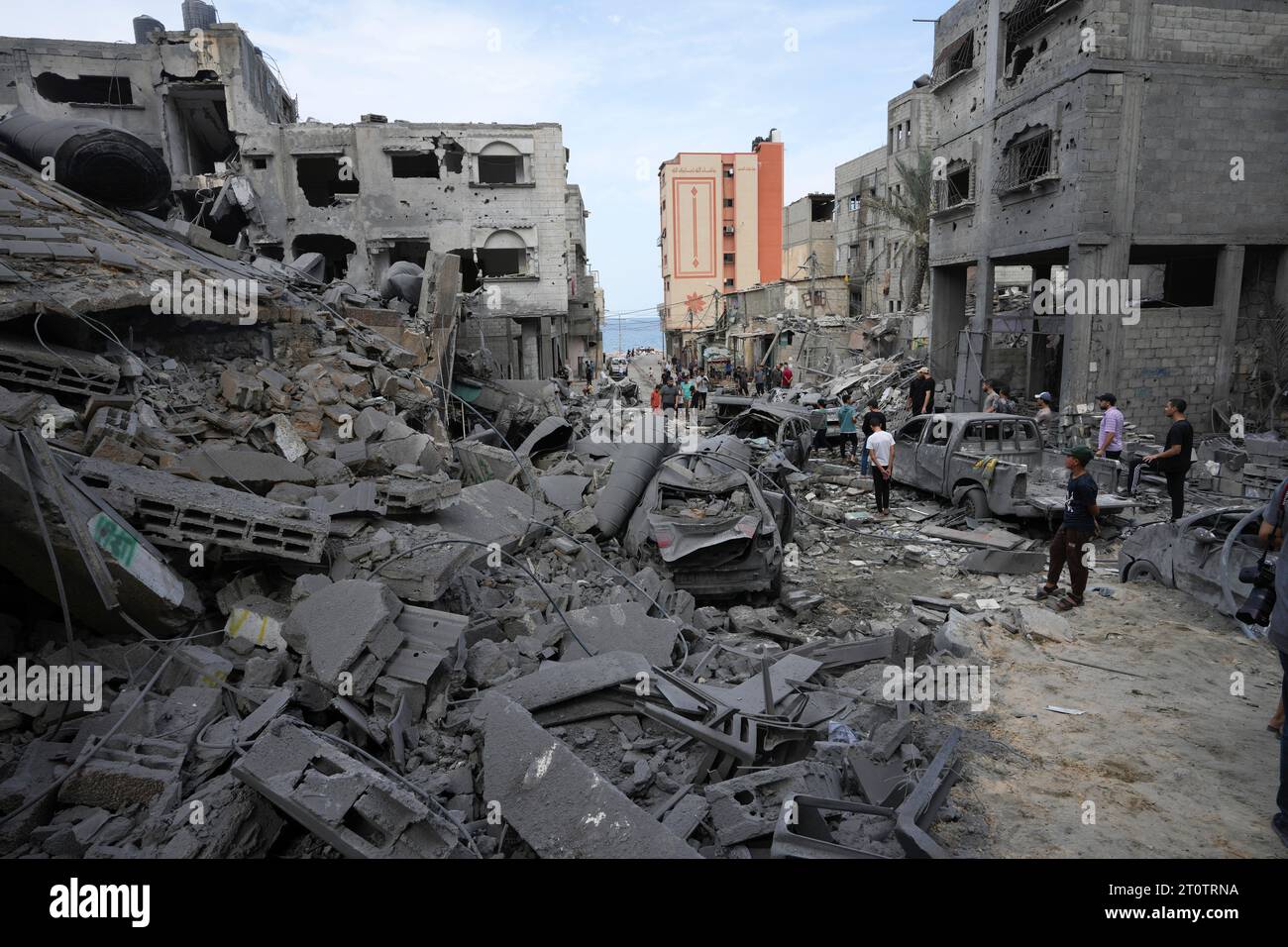 CORRECTS NAME OF THE MOSQUE - Palestinians inspect the rubble of the ...