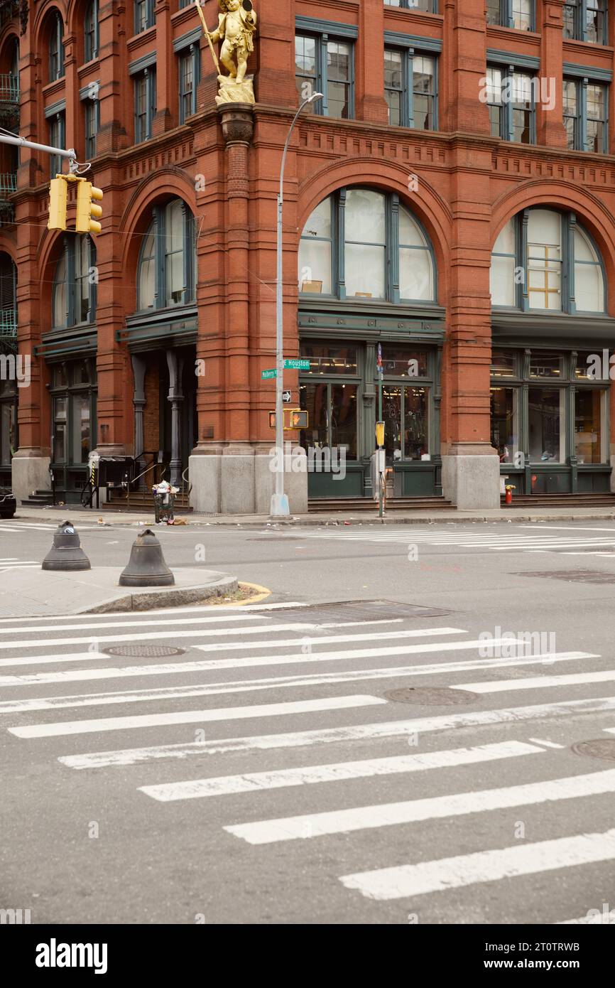 famous puck building near pedestrian crossing in manhattan district ...
