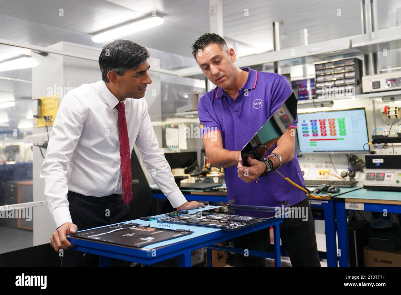 Prime Minister Rishi Sunak during a visit to the Currys Repair Centre ...