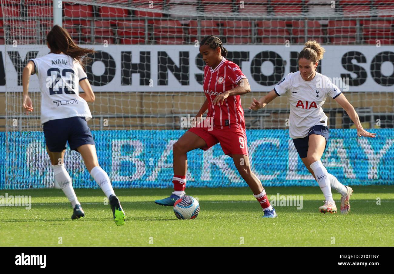 Shania Hayles of Bristol City Women holds of Luana Buhler of Tottenham ...