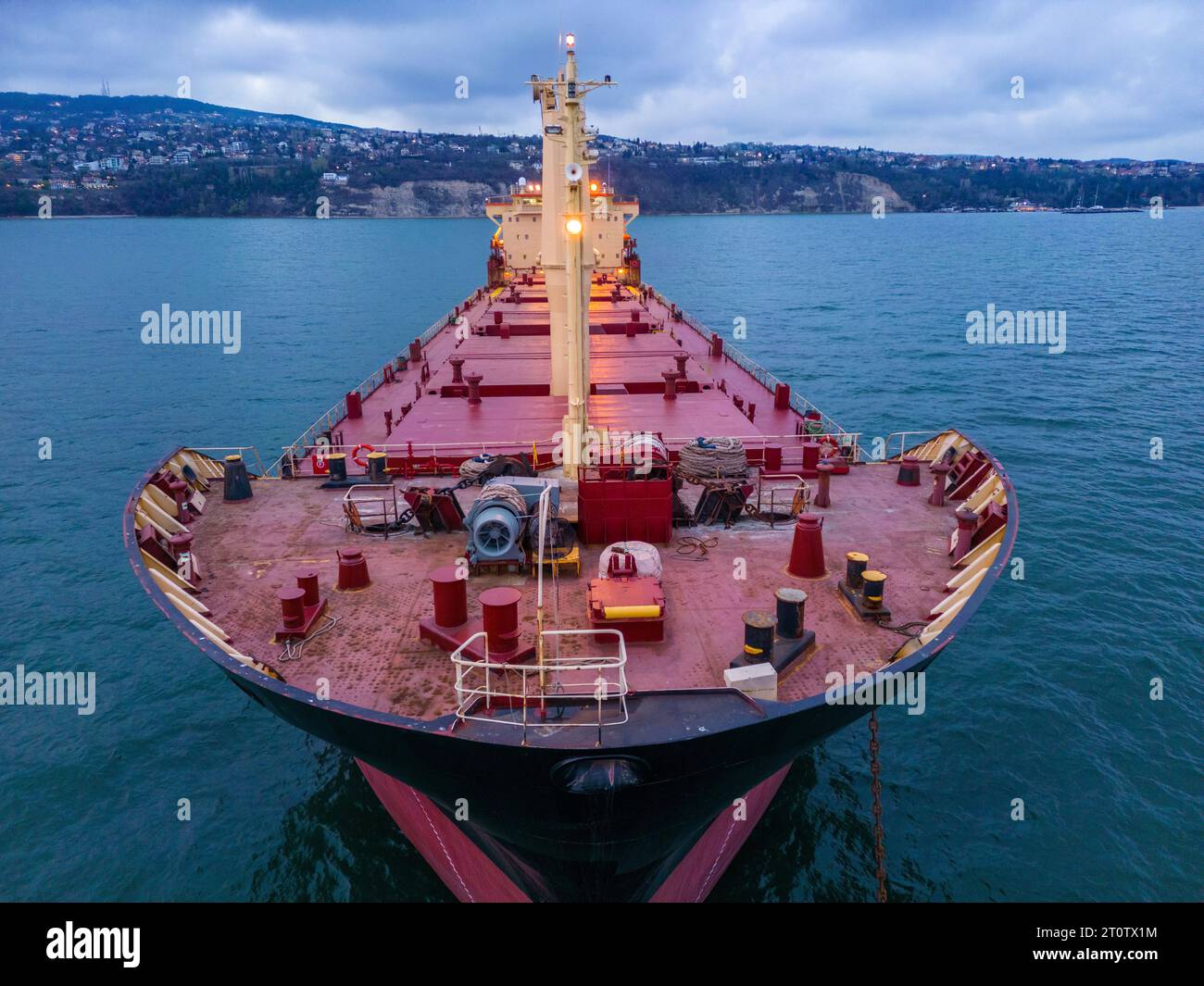 aerial view of a bulk carrier at evening showcases a stunning display ...