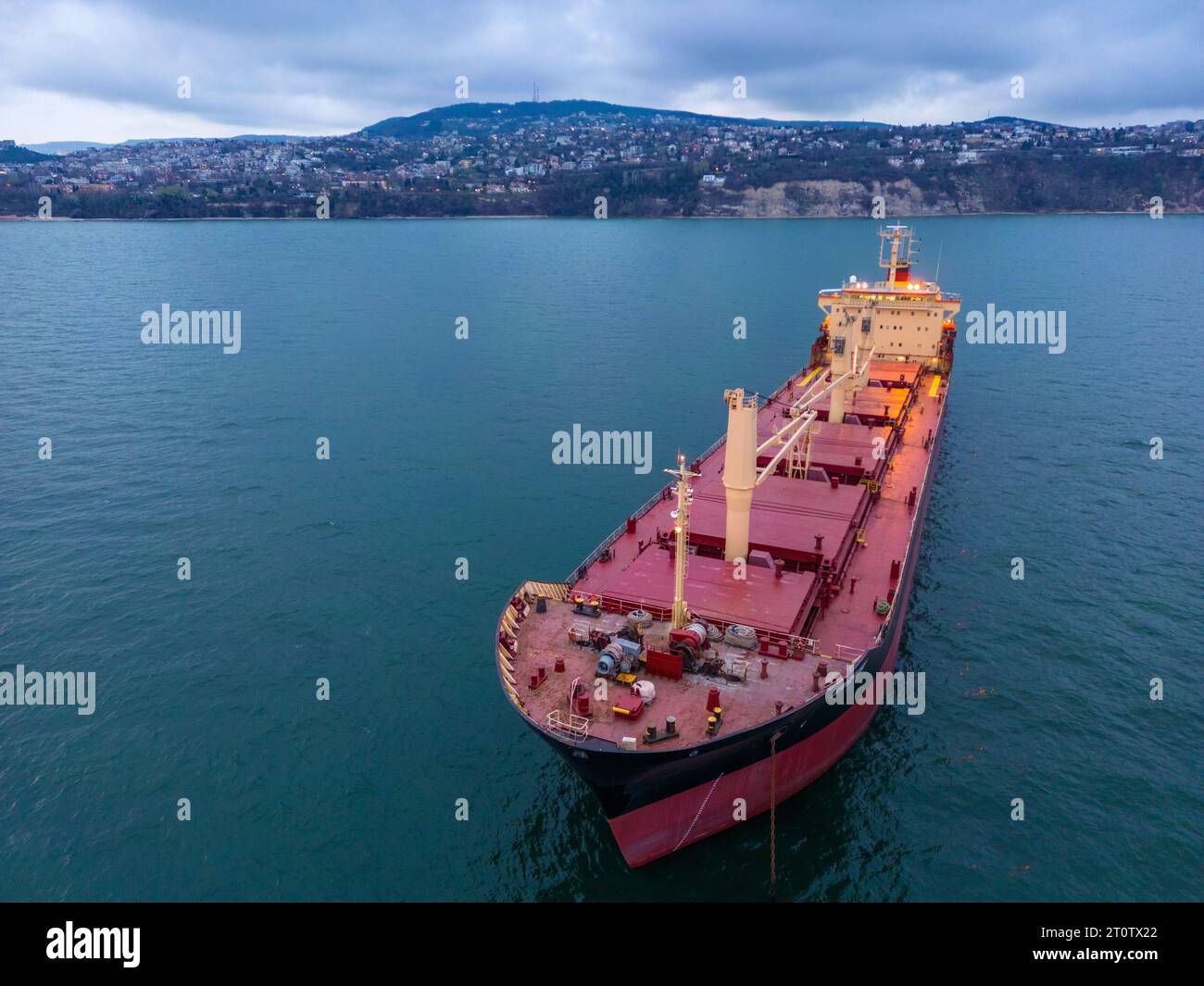 aerial view of a bulk carrier at evening showcases a stunning display ...