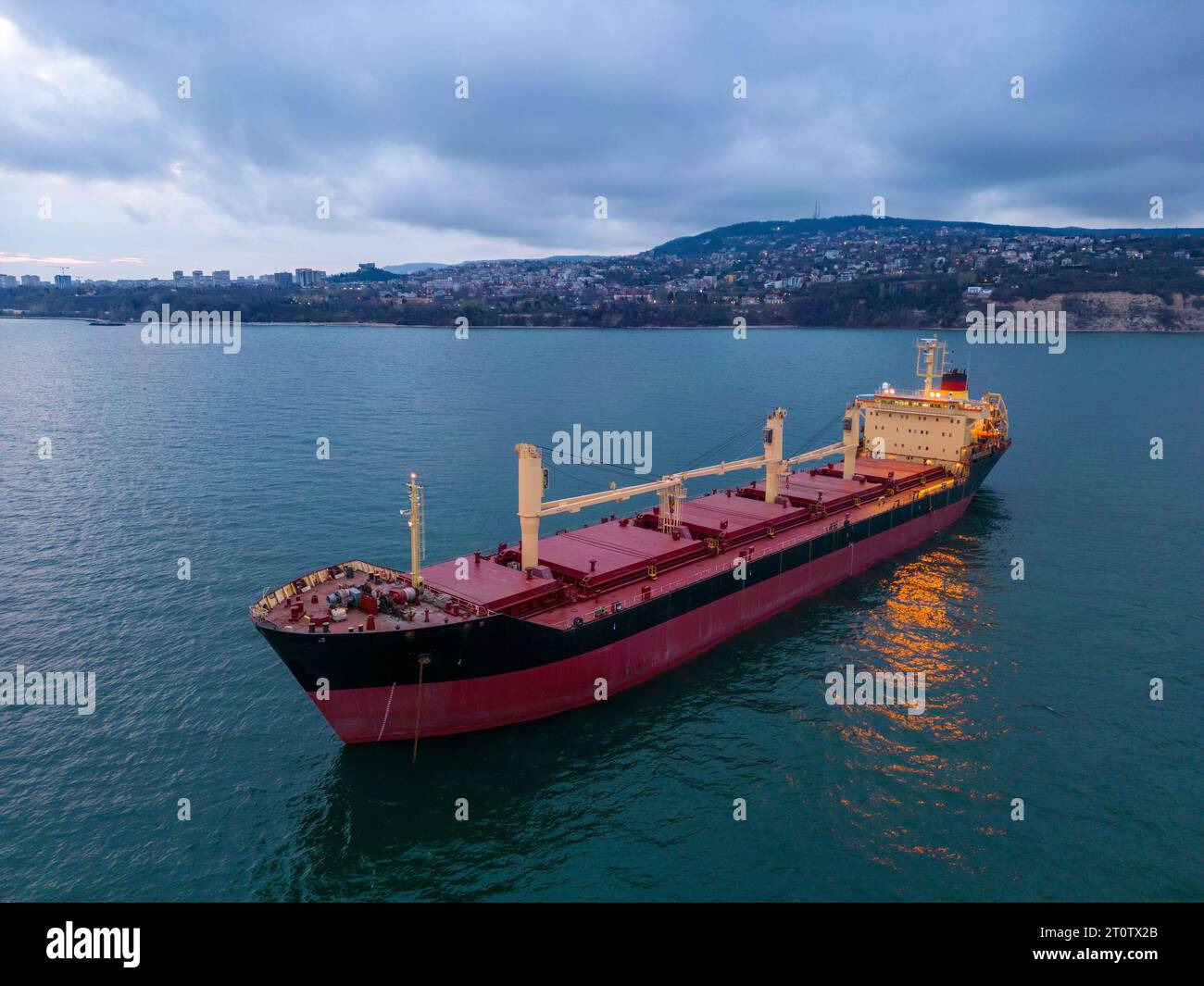 aerial view of a bulk carrier at evening showcases a stunning display ...