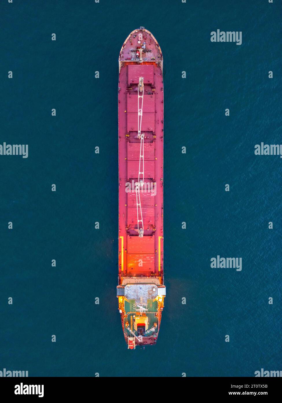 aerial view of a bulk carrier at evening showcases a stunning display ...