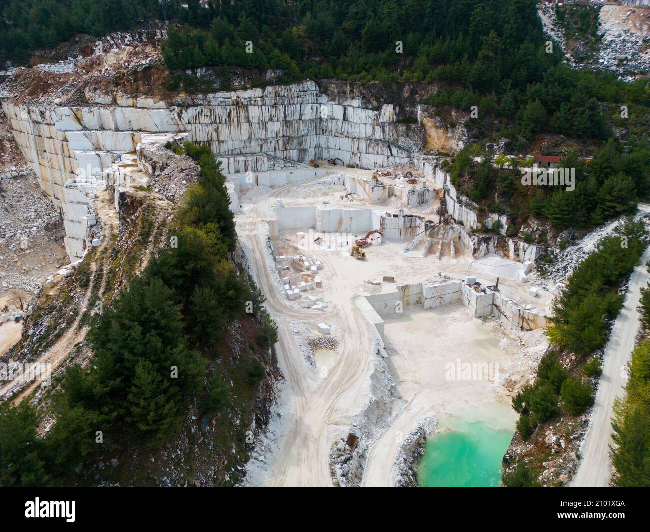 An aerial top view of the Thassos Island quarry showcases the ...