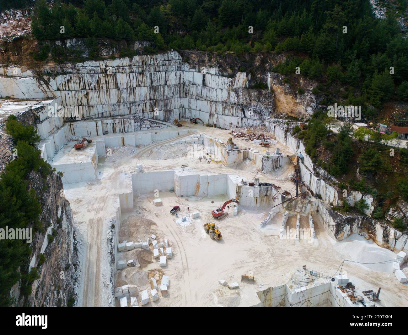 An aerial top view of the Thassos Island quarry showcases the ...