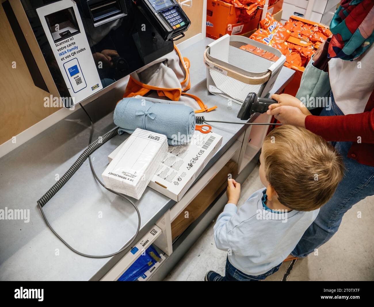 Paris, France - Aug 31, 2023: An overhead view reveals a toddler and ...