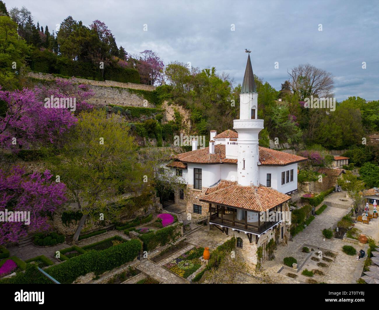 aerial top view of the palace nestled in the botanical garden in ...