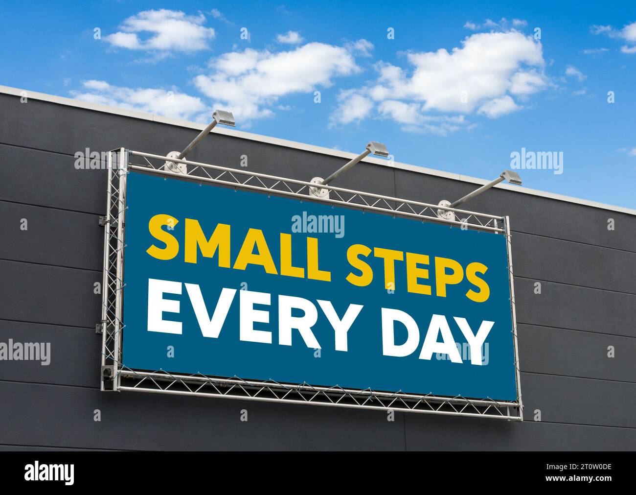 Small steps every day written on a billboard Stock Photo - Alamy
