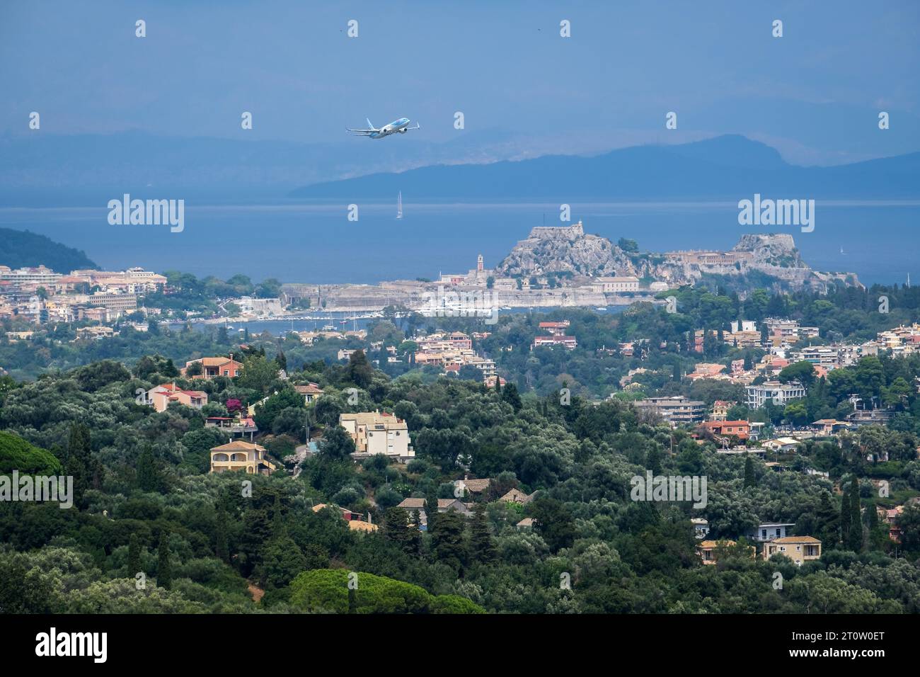Corfu Town, Corfu, Greece - Corfu Town city overview. TUI airplane take ...