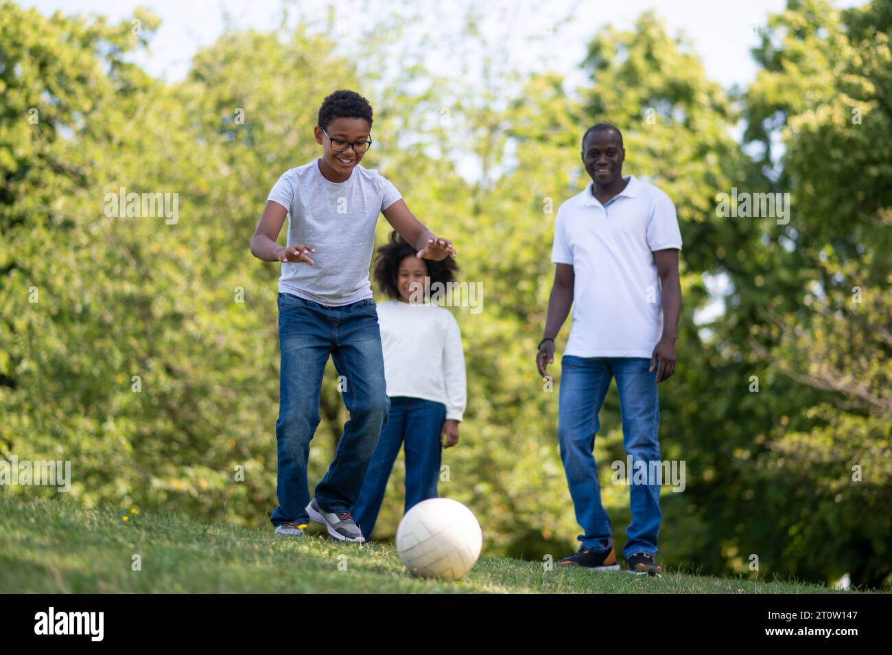 Family Playing Football Together