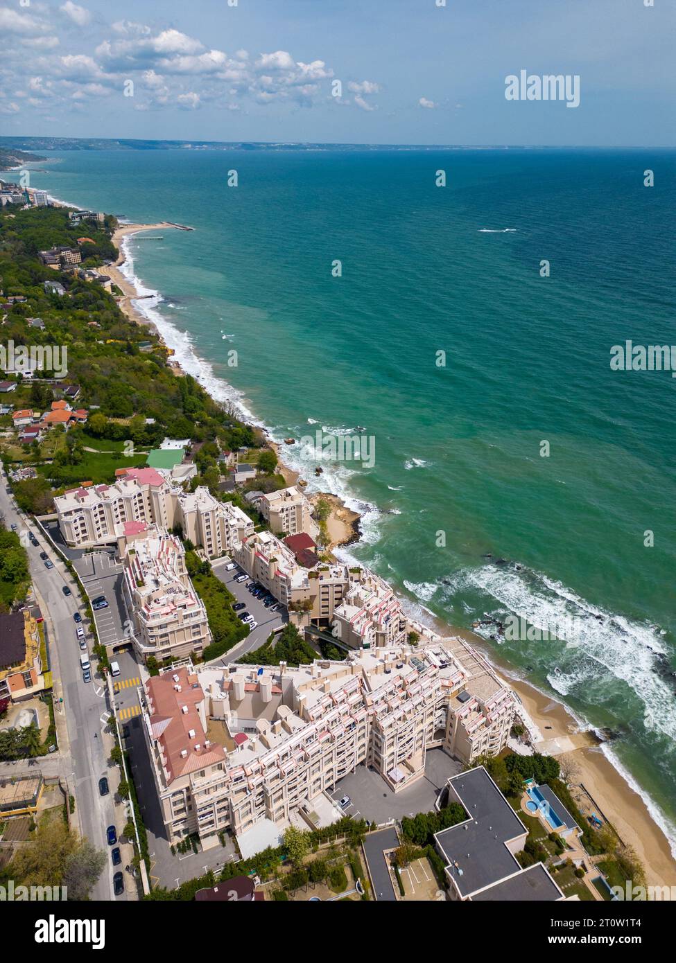 A stunning view of an exclusive residential complex nestled by the sea ...