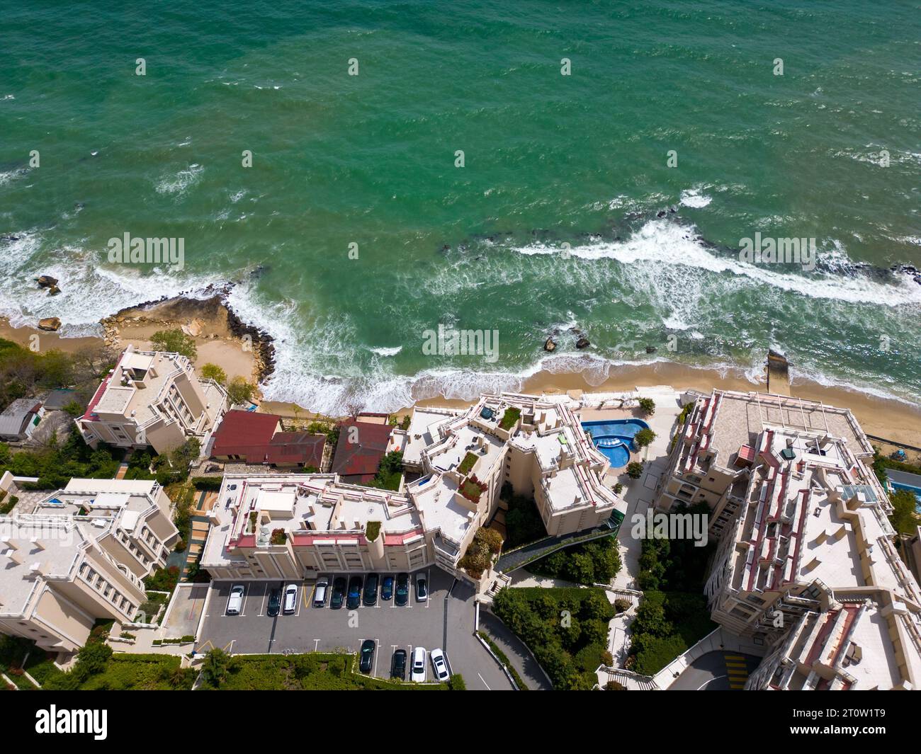 A stunning view of an exclusive residential complex nestled by the sea ...