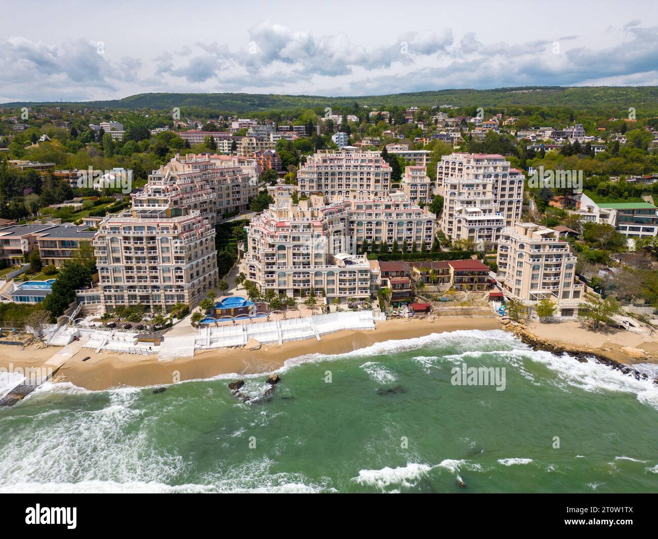 A stunning view of an exclusive residential complex nestled by the sea ...