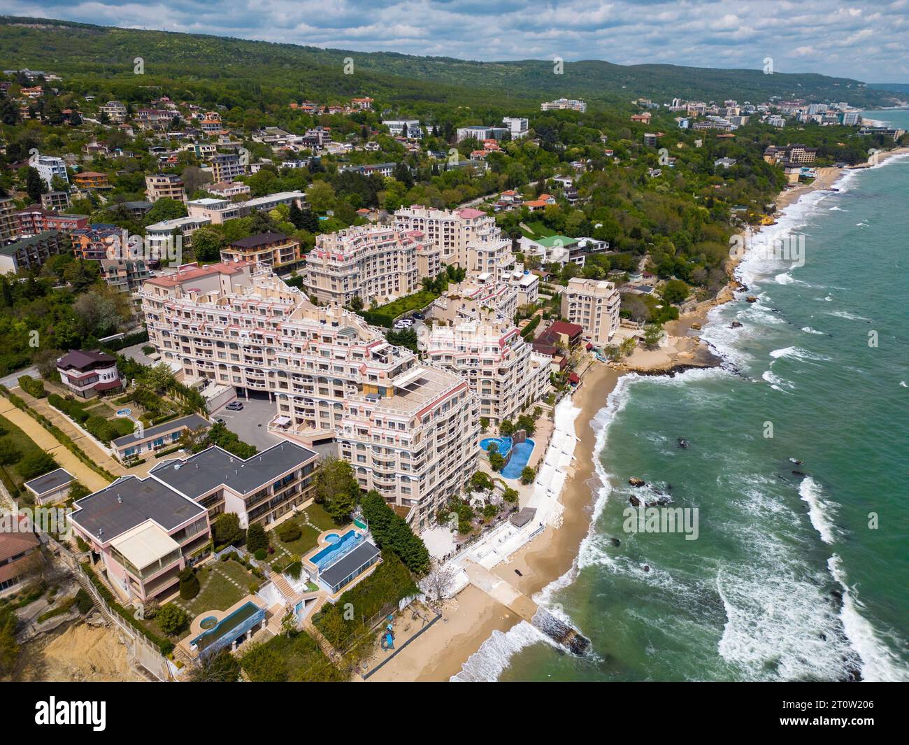 A stunning view of an exclusive residential complex nestled by the sea ...