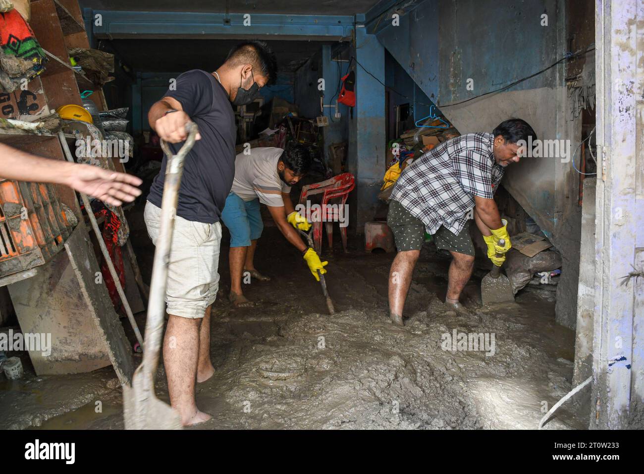 Singtam, India. 09th Oct, 2023. Sanjay Prasad (R) along with his sons ...