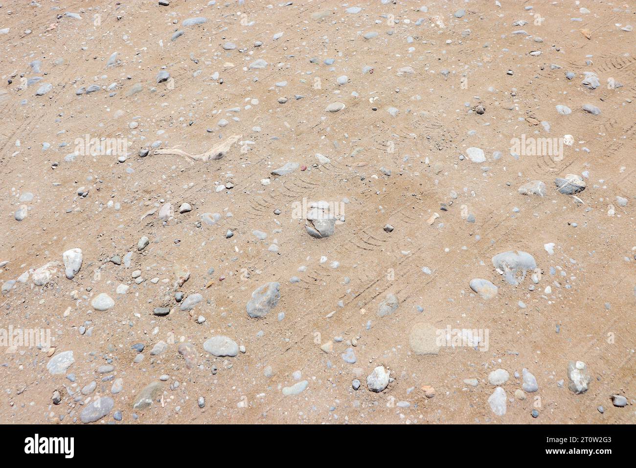 Abstract background beach sand with rocks on the ground Stock Photo - Alamy