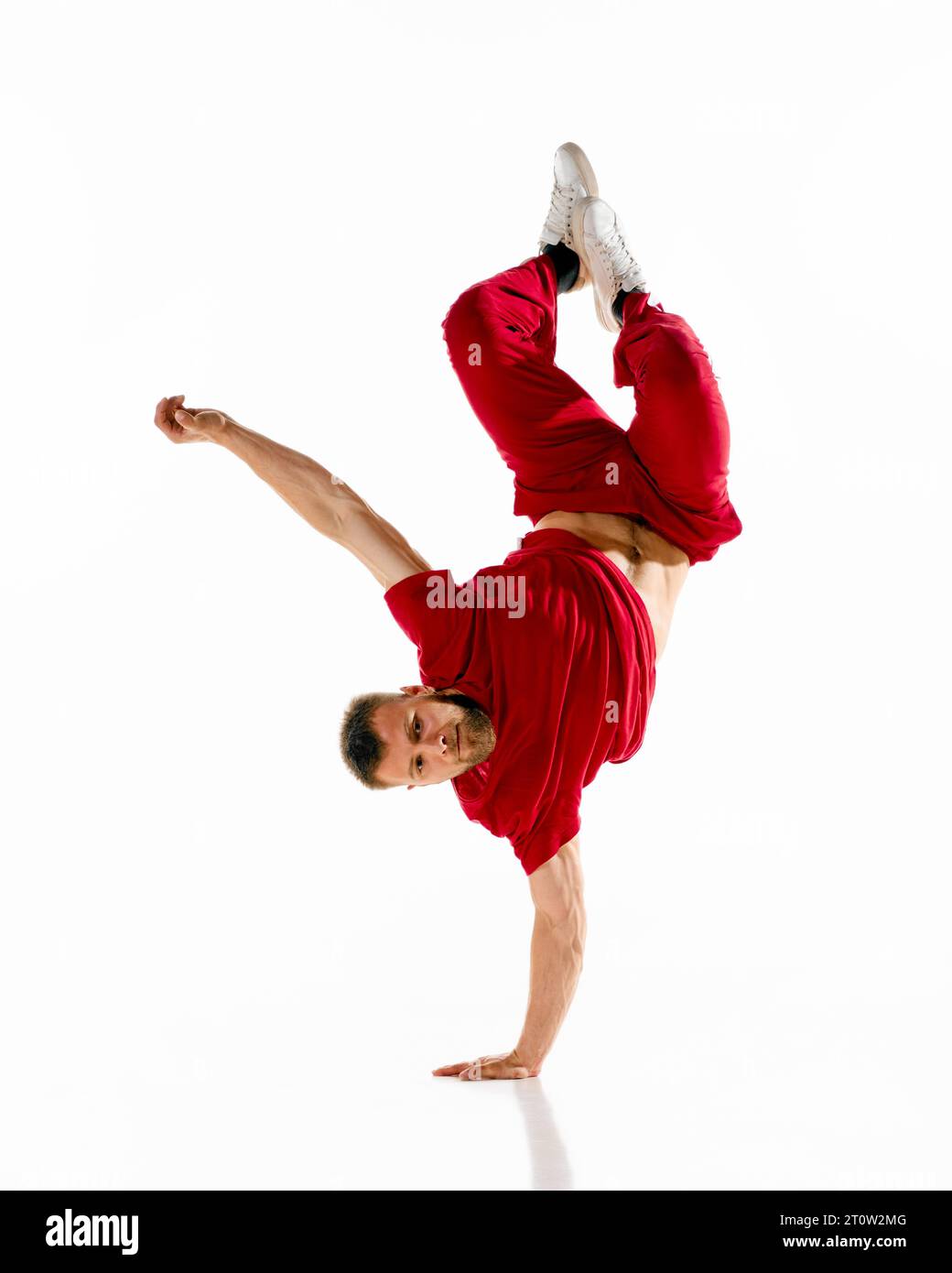 Young attractive man, guy, dancer wearing stylishly cloth dancing hip ...