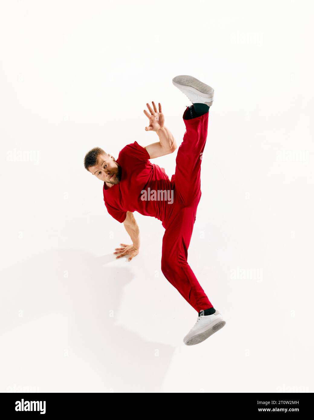 Top view portrait of stylishly dressed young man, dancer performing ...