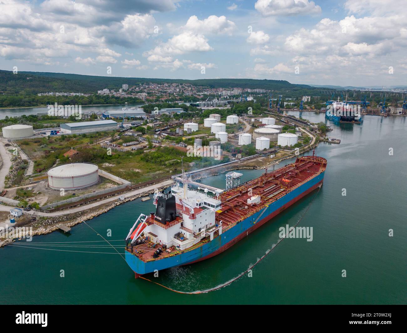 Aerial top view of oil ship tanker and lpg ship at industrial port ...