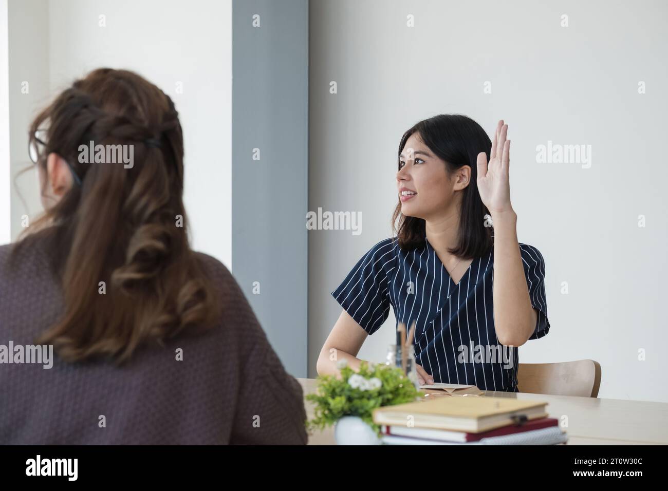 Cheerful English teacher discussion with Asian students Stock Photo - Alamy