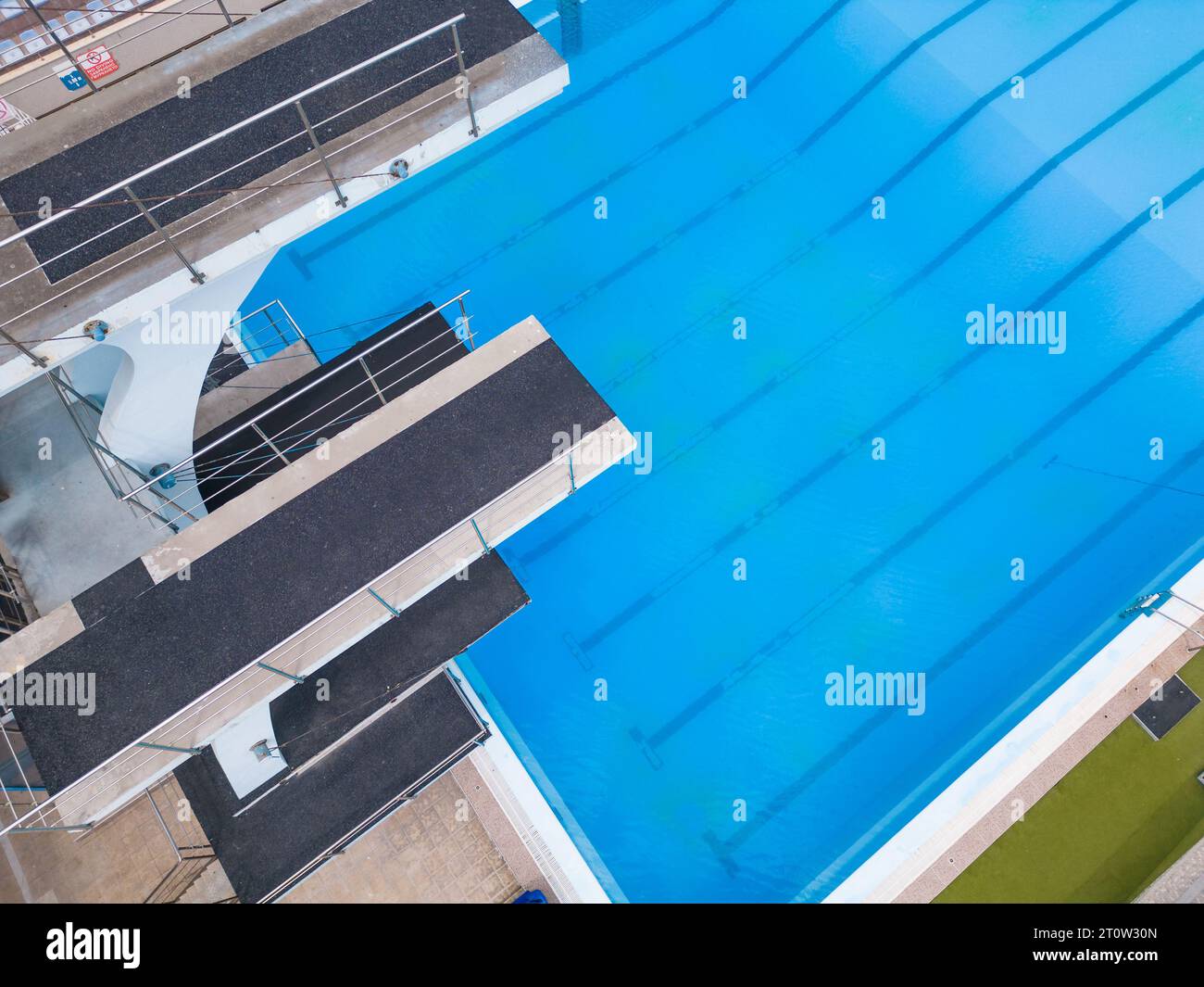 The diving towers stand tall, their vibrant presence contrasting ...