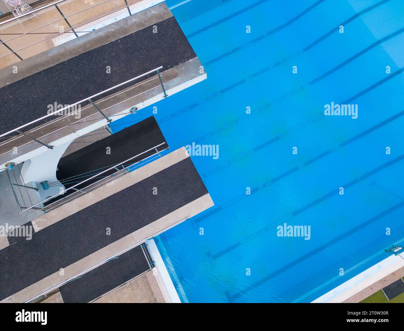 The diving towers stand tall, their vibrant presence contrasting ...