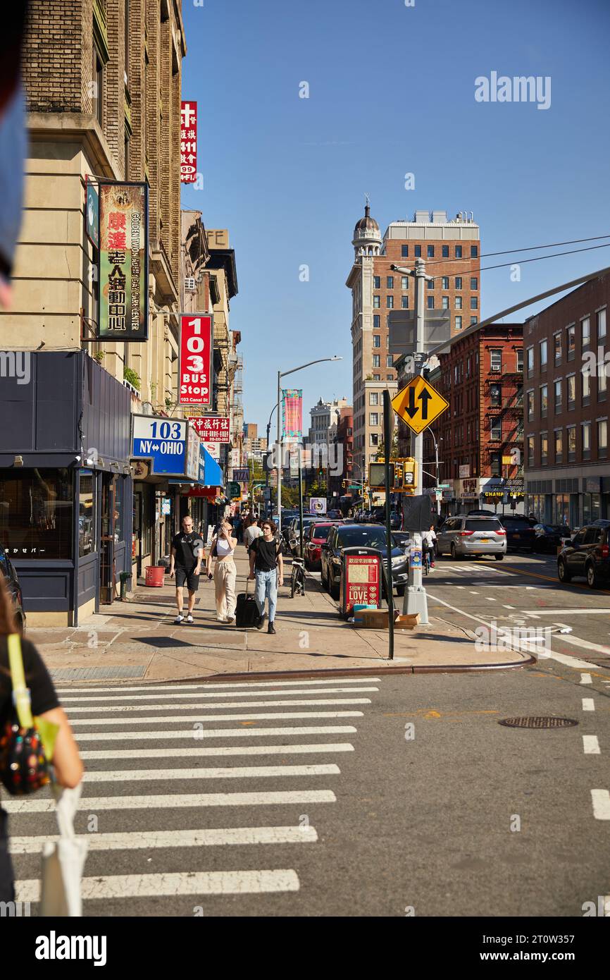 NEW YORK, USA - NOVEMBER 26, 2022: pedestrians walking along busy ...