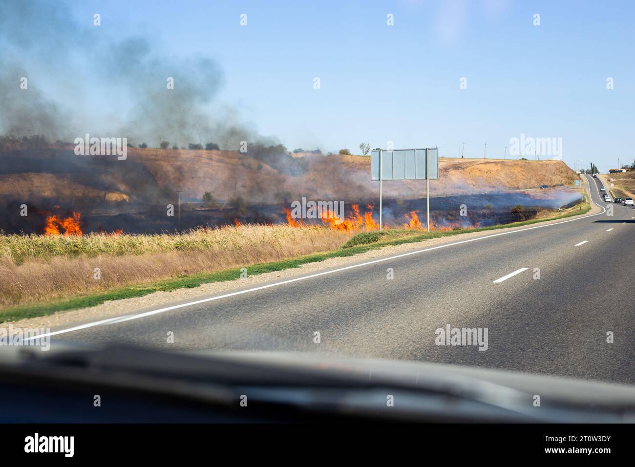 Fire burning side of road hi-res stock photography and images - Alamy