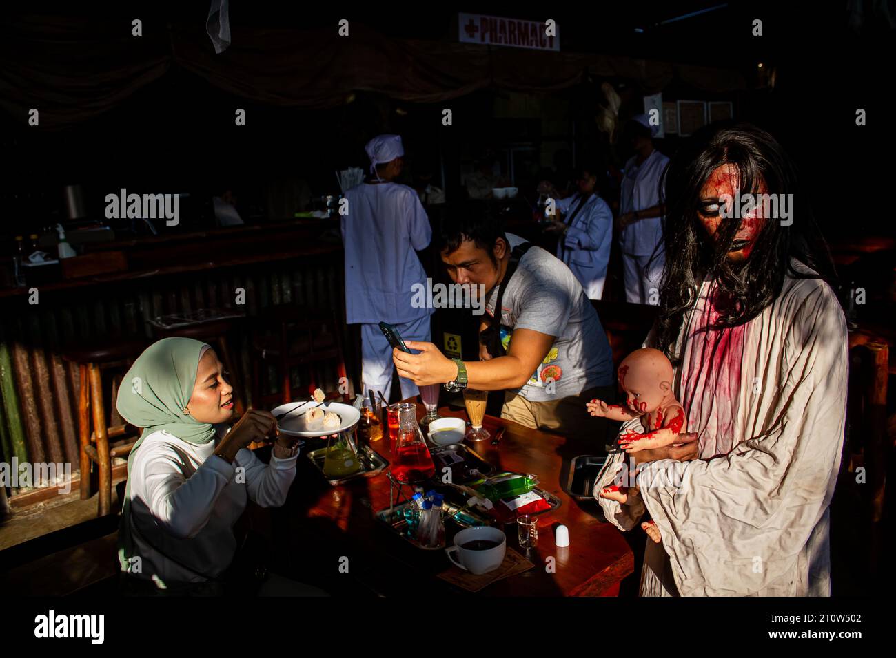 Bandung, West Java, Indonesia. 9th Oct, 2023. A man dressed as a ghost ...