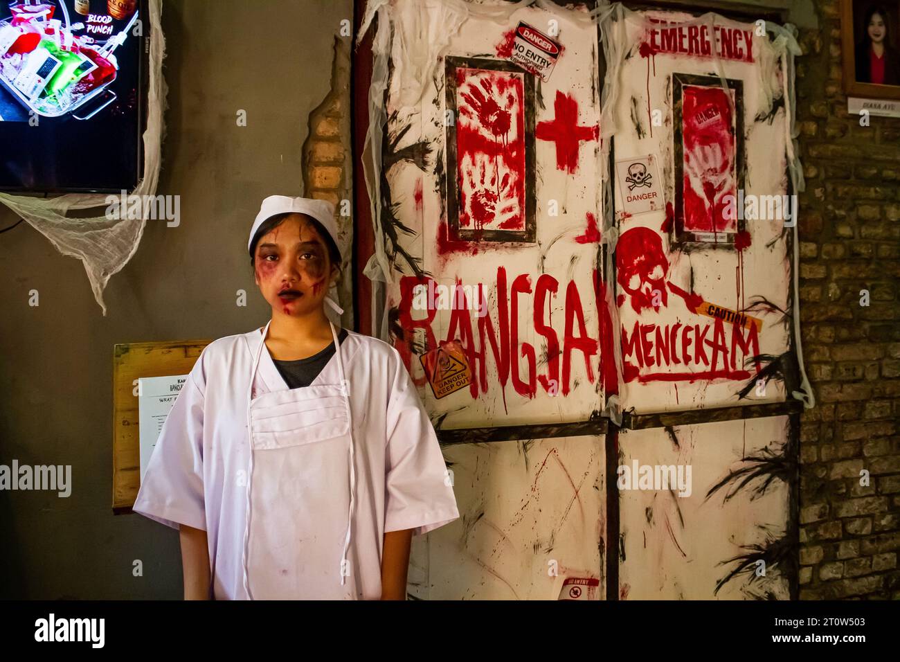 Bandung, West Java, Indonesia. 9th Oct, 2023. A receptionist dressed as ...