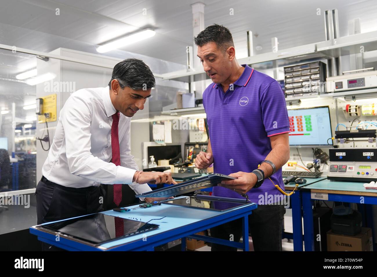 Prime Minister Rishi Sunak during a visit to the Currys Repair Centre ...