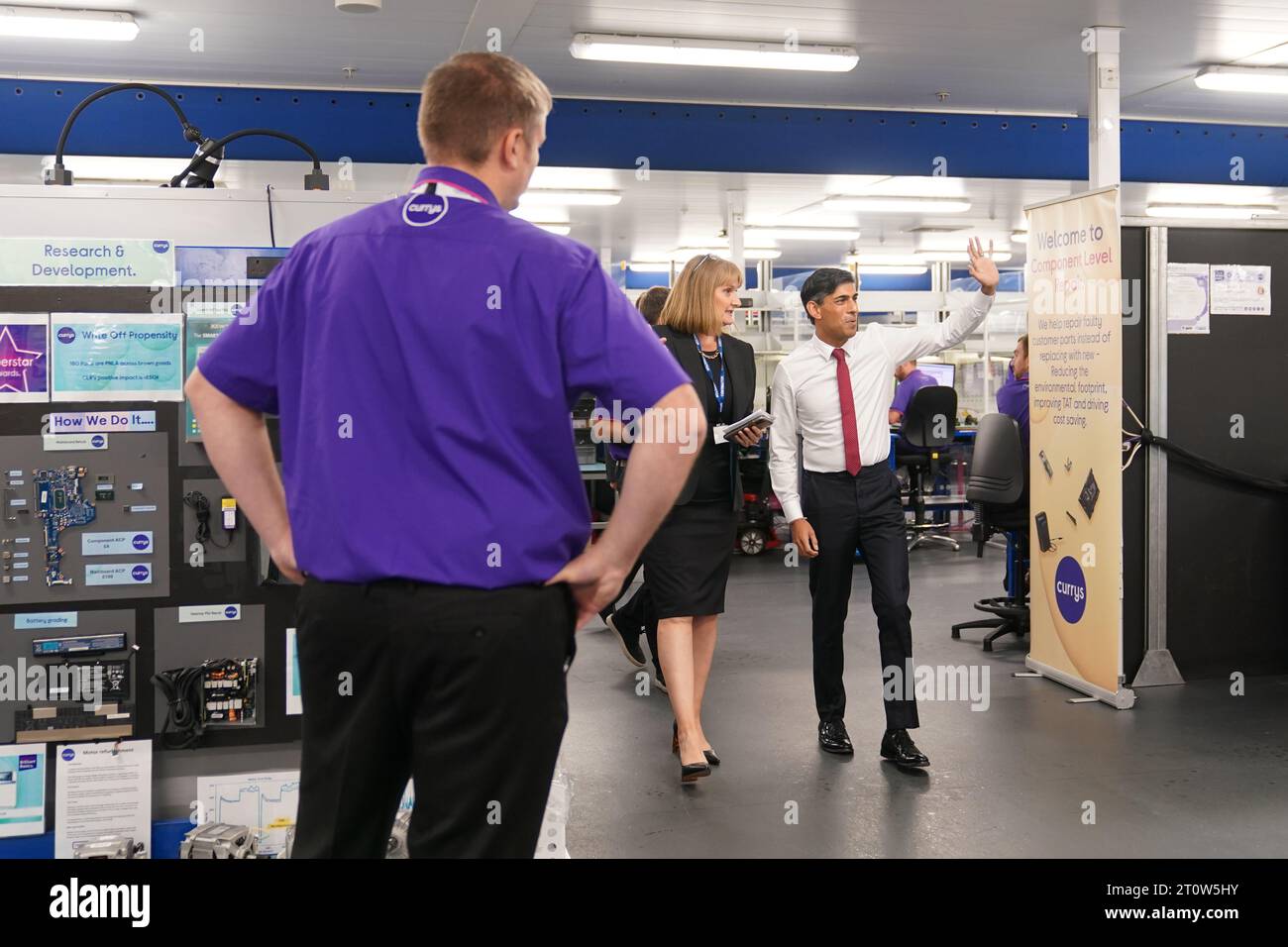 Prime Minister Rishi Sunak during a visit to the Currys Repair Centre ...