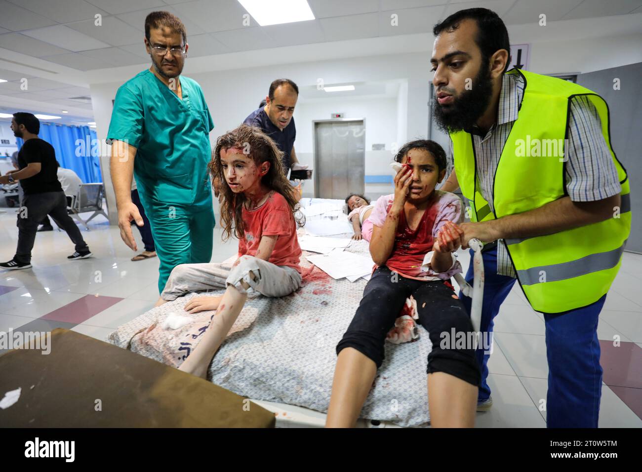 Palestinian medics treat wounded children at Shifa Hospital in Gaza ...
