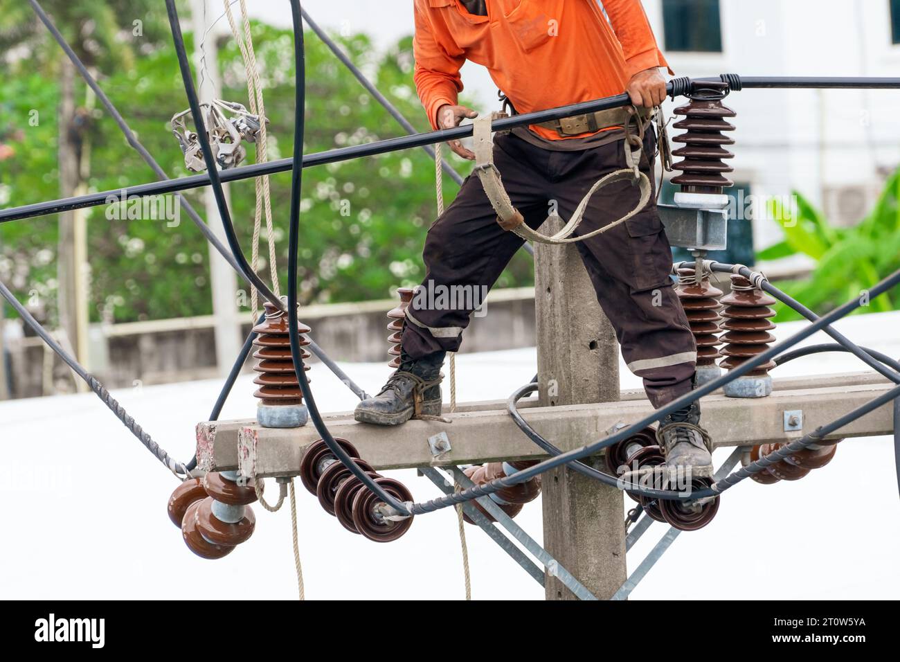 High voltage power line maintenance. Electrician at work. Electrical ...