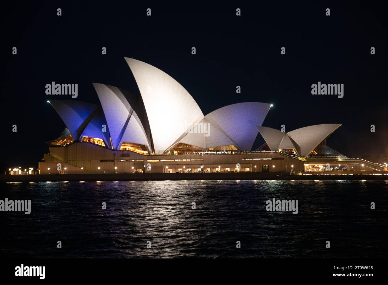 Sydney, Australia. 9th October 2023. Sydney Opera House is lit up in ...