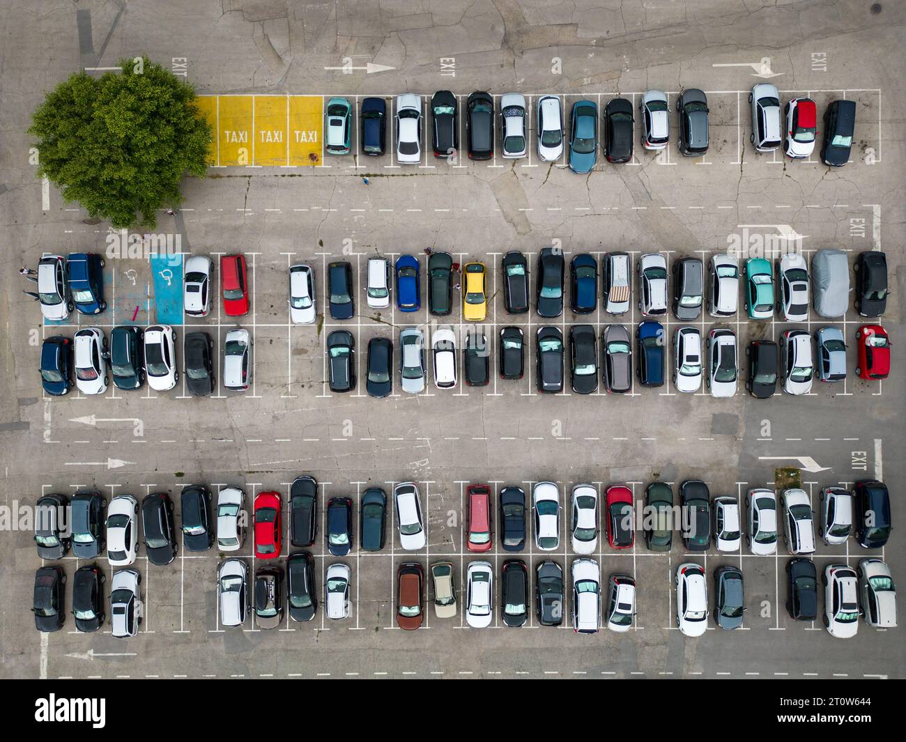 Drone's aerial view reveals a densely packed parking lot filled with ...