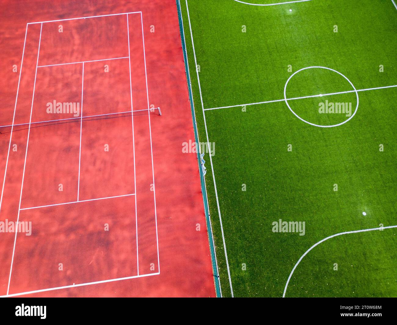 Aerial view of a soccer field and a tennis court, spaces for activity ...